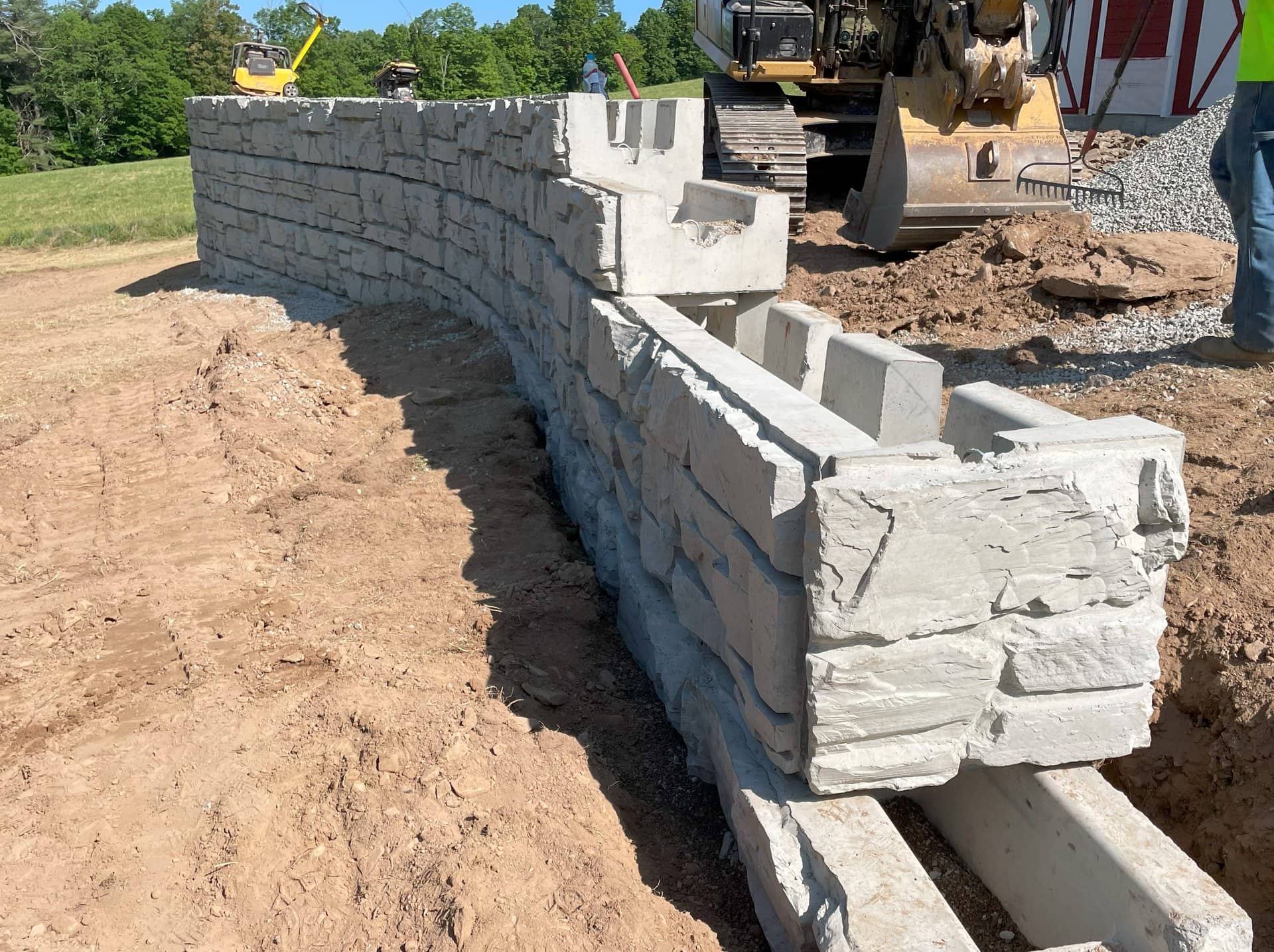 Why Concrete Blocks Build Better Retaining Walls Than Wood Railroad Ties