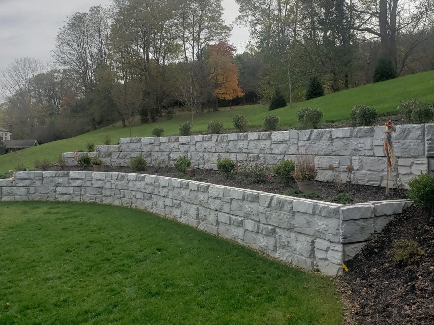 Why Concrete Blocks Build Better Retaining Walls Than Wood Railroad Ties